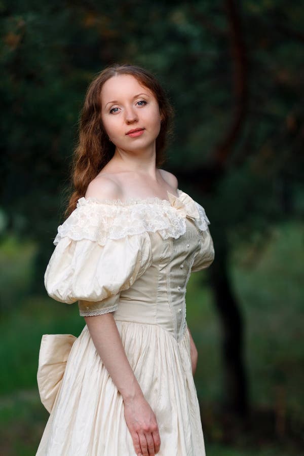 Beautiful Woman In Vintage Dress Beige Cute Girl In Long Dress Walking