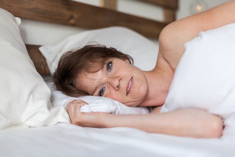 A beautiful woman wakes up stock image. Image of face - 120577123 A beautiful woman wakes up stock image. Image of face - 120577123