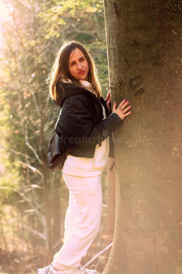 Beautiful Woman on a Walk in the Mountains in the Forest. Stock Image ...