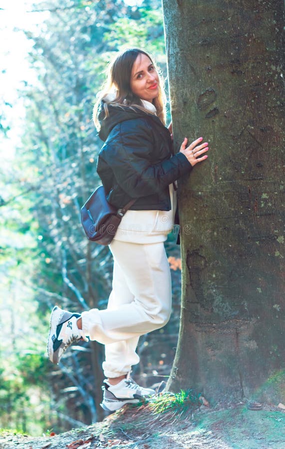 Beautiful Woman on a Walk in the Mountains in the Forest. Stock Image ...