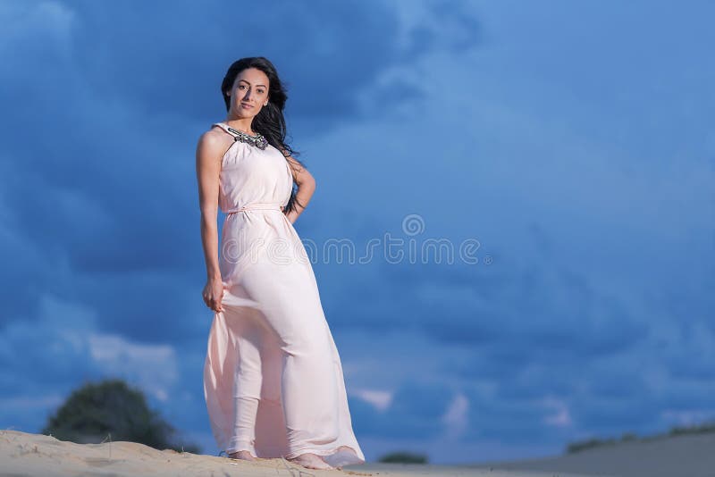 Beautiful Woman Walking on a Sand Dune Stock Image - Image of long ...