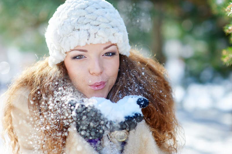 Beautiful Woman in Winter Blows Snow with Hands Stock Image - Image of ...