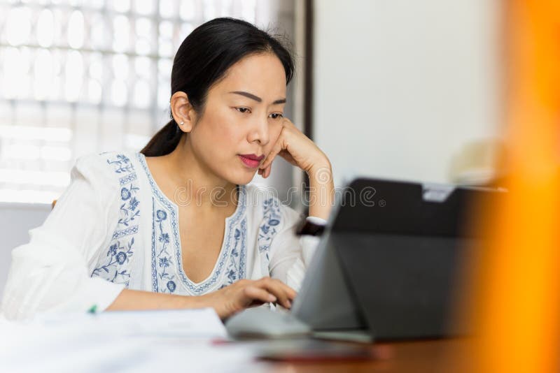 Beautiful Woman Working on Laptop Computer at Home. Stock Image - Image ...