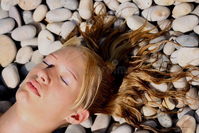 Beautiful Womans Head on a Peble Beach. Stock Photo - Image of head ...