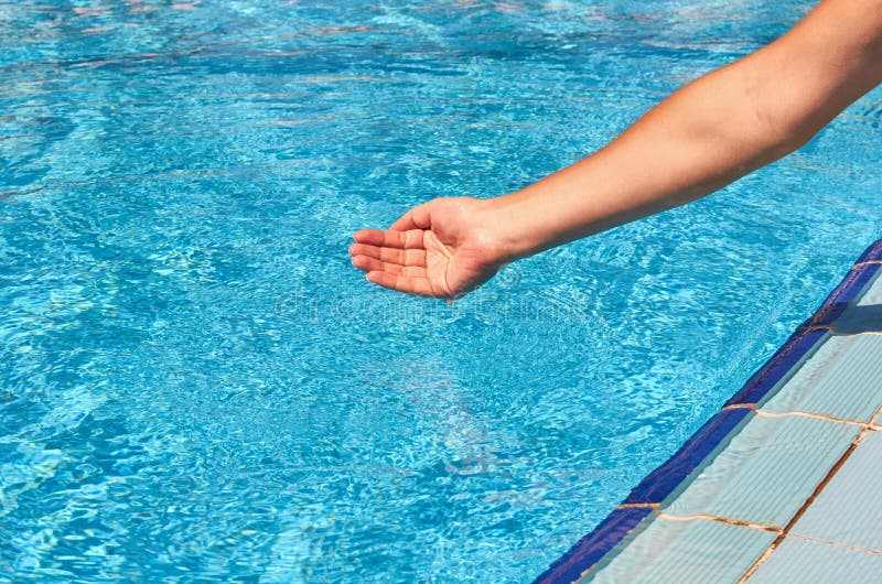 Beautiful Women Hand by the Swimming Pool Stock Image - Image of ...