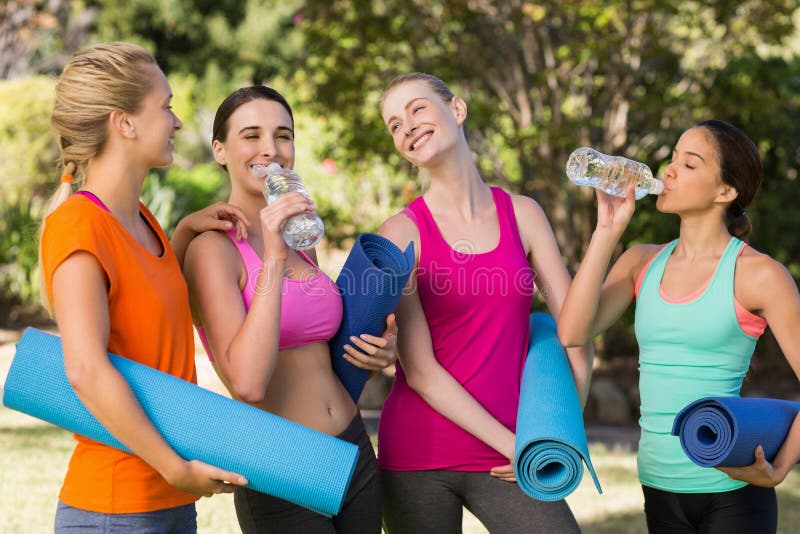 Beautiful Women Holding Exercise-mat in Park Stock Image - Image of ...