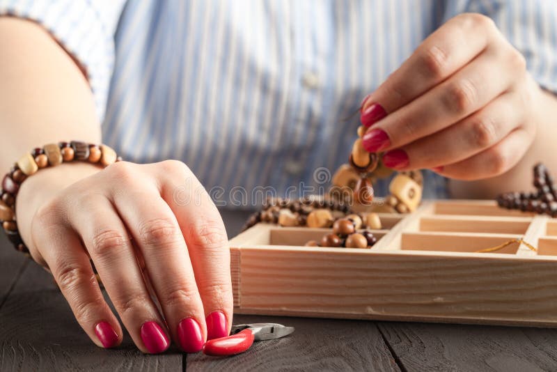 Beautiful Women at the Table Making Jewelry Stock Image - Image of ...