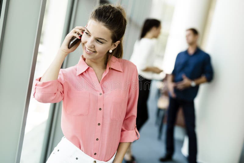 Beautiful Women Using Phones and Talkin during Break Stock Photo ...