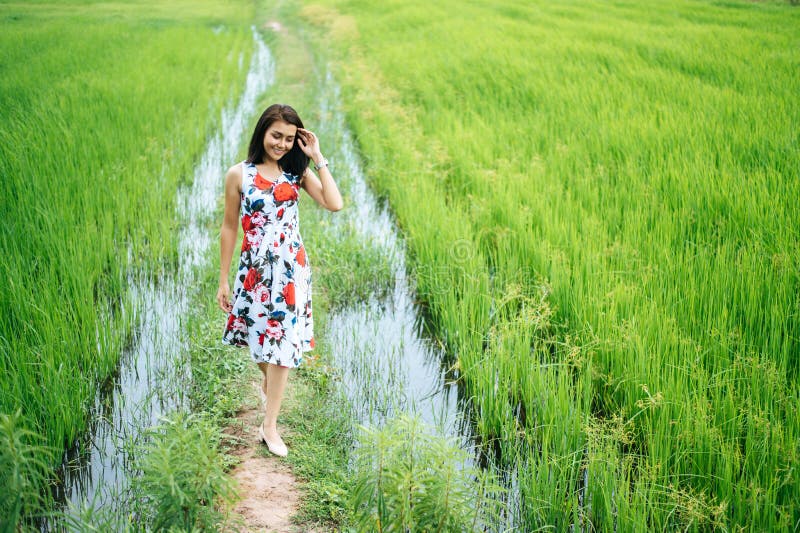 Beautiful Women Walk Happily on the Meadow Stock Photo - Image of grass ...