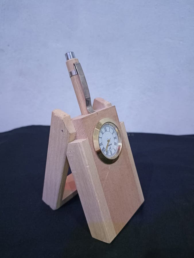 A Beautiful Wooden Clock with a Pen Stock Image - Image of clock, apen ...