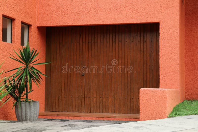 Beautiful Wooden Doors on Bright Building Wall Stock Image - Image of ...
