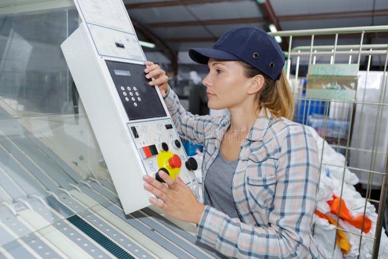 Beautiful Worker Operating Machine in Factory Stock Image - Image of ...