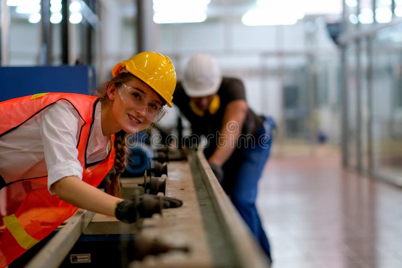 Beautiful Worker or Technician or Engineer Woman Smile and Look Forward ...