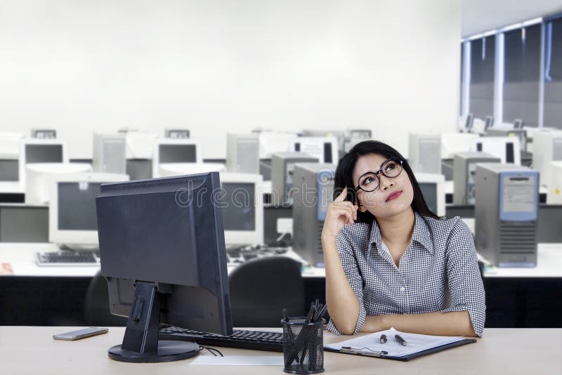 Beautiful Worker Thinking Idea in Office Stock Photo - Image of ...