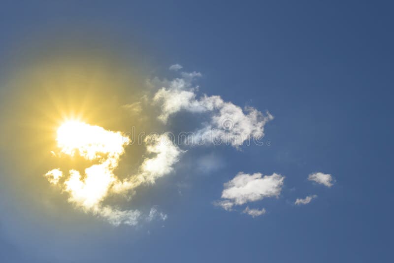Beautiful Yellow Sun through Clean White Clouds Stock Photo - Image of ...