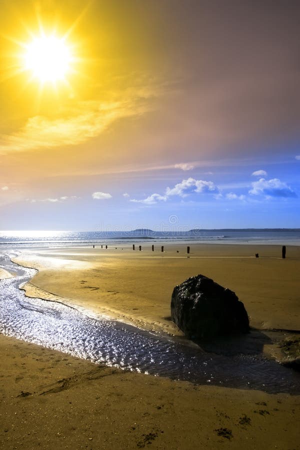 Yellow Sun Over the Ballybunion Beach and Castle Stock Photo - Image of ...