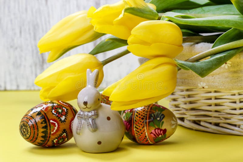 Beautiful Yellow Tulips, Easter Eggs and Ceramic Rabbit Stock Image ...