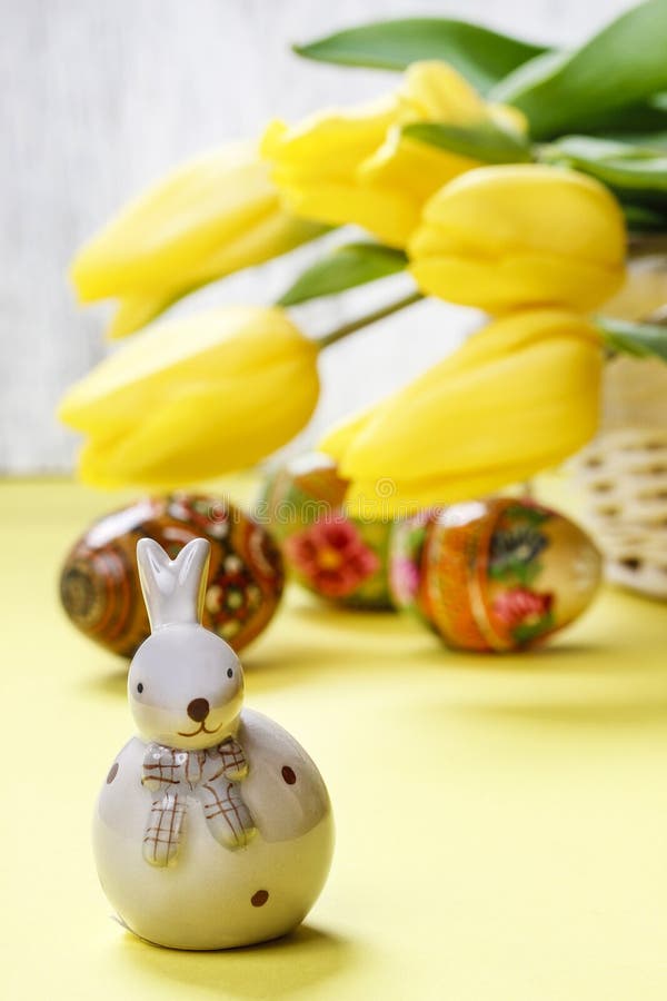 Beautiful Yellow Tulips, Easter Eggs and Ceramic Rabbit Stock Photo ...