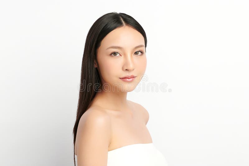 Beautiful Young Asian Woman With Clean Fresh Skin On White Background
