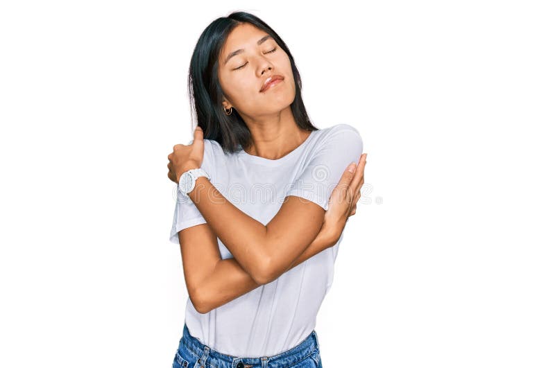 Beautiful Young Asian Woman Wearing Casual White T Shirt Hugging