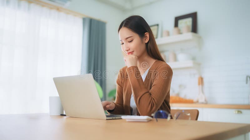 Beautiful Young Asian Woman Working with Laptop Computer in Home ...