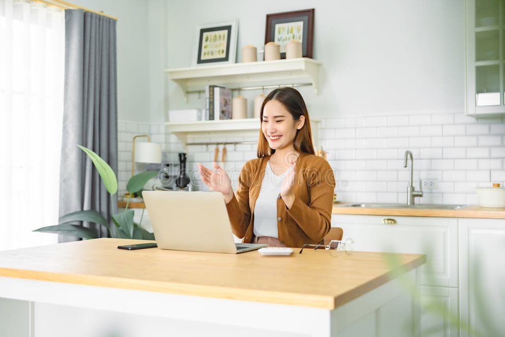 Beautiful Young Asian Woman Working with Laptop Computer in Home Kitchen Stock Photo - Image of ...