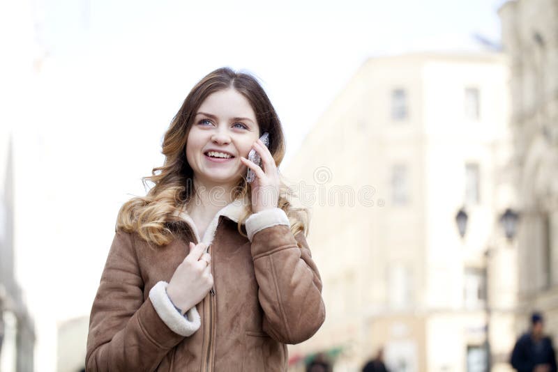 Beautiful Young Blonde Calling by Phone Stock Photo - Image of outside ...