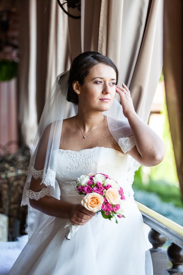 Beautiful young bride stock photo. Image of contact, bouquet - 61332518