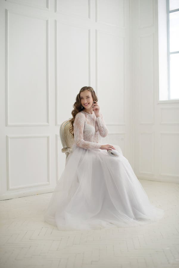 Beautiful Young Bride Sitting on a Chair Stock Photo - Image of ...