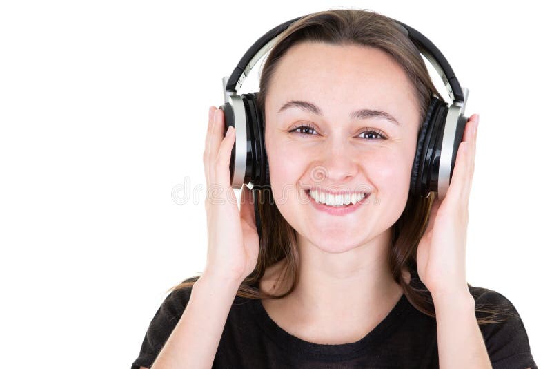 Beautiful Young Caucasian Woman Listening To Music With Headphones