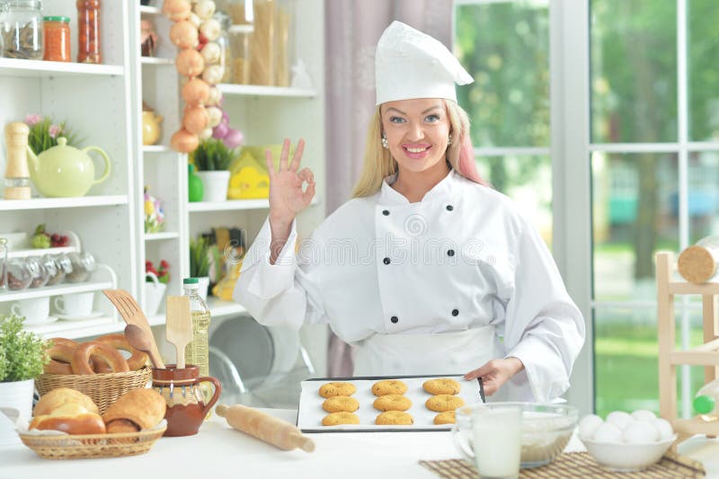Beautiful Young Chief Woman Baking in Kitchen Stock Image - Image of ...