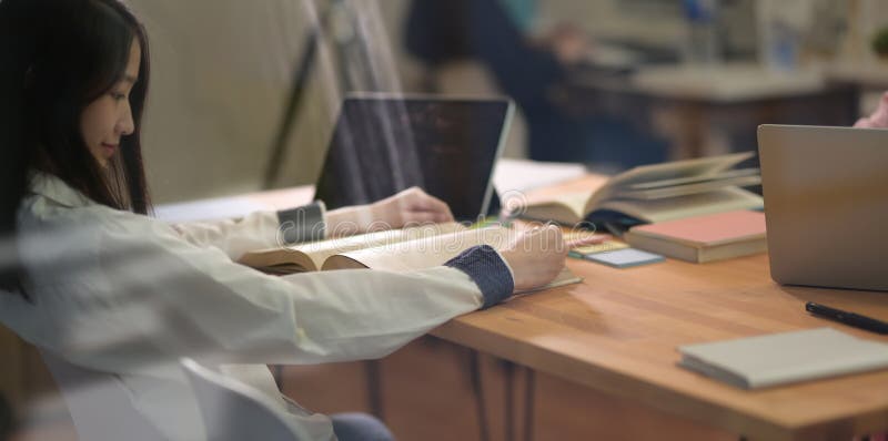 Beautiful Young College Student Reading for Exam Stock Image - Image of ...
