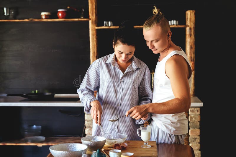 Beautiful Young Couple Cooking in Kitchen at Home Stock Photo - Image ...