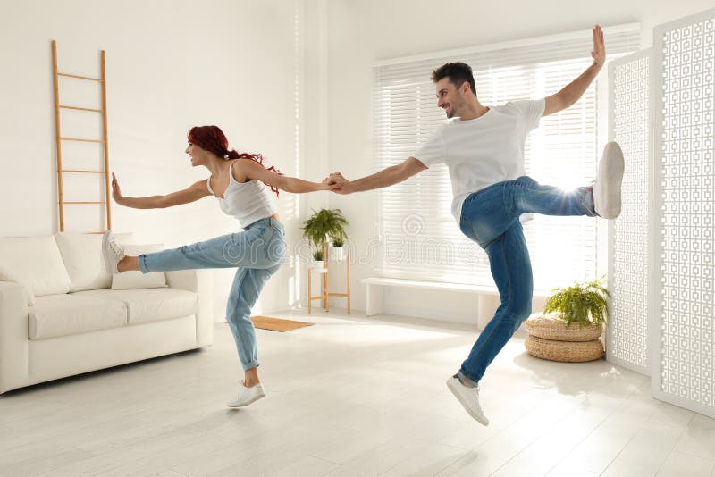 Beautiful Young Couple Dancing in Room Stock Image - Image of beautiful ...