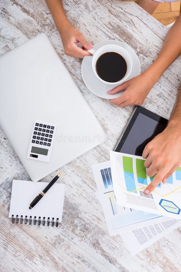 A Beautiful Young Couple Discuss Business Stock Image - Image of ...