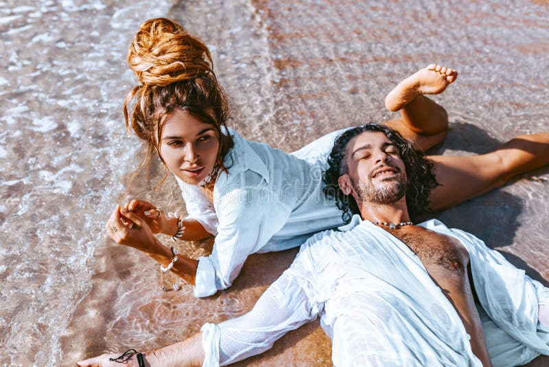 Beautiful Young Couple Having Fun at the Beach Stock Photo - Image of ...