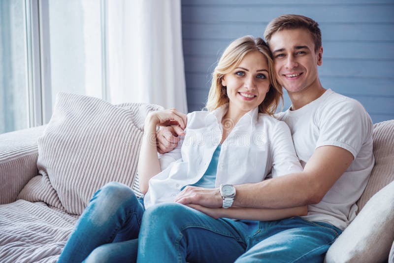 Beautiful Young Couple at Home Stock Photo - Image of happy, caucasian ...