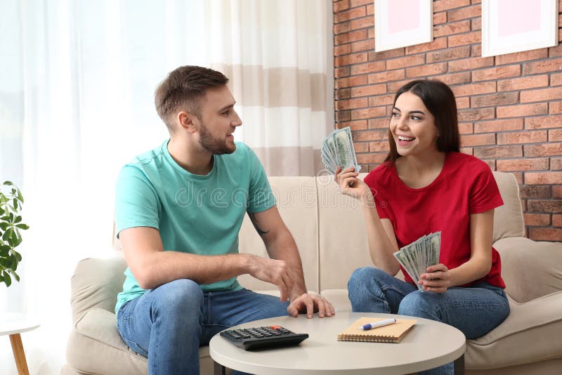 Beautiful Young Couple with Money Stock Image - Image of financial ...