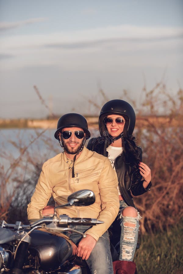 Beautiful Young Couple with a Motorcycle Stock Photo - Image of fashion ...