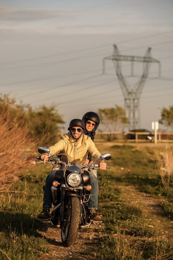 Beautiful Young Couple with a Motorcycle Stock Photo - Image of ...