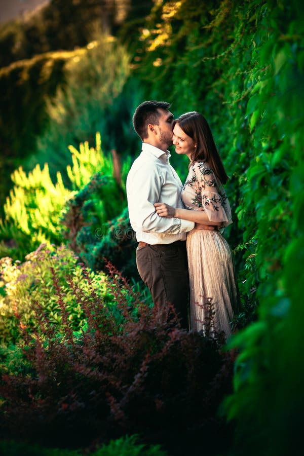 Beautiful Young Couple on a Nature Background Stock Photo - Image of ...