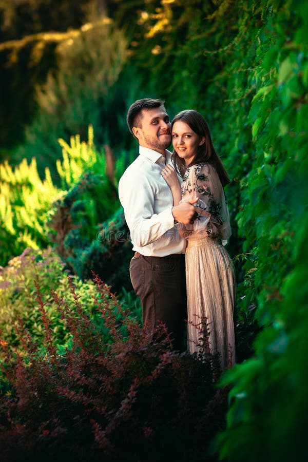 Beautiful Young Couple on a Nature Background Stock Image - Image of ...