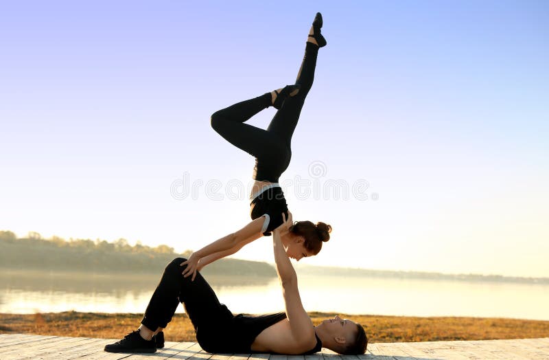 Beautiful Young Couple Practicing Dance Moves Near River Stock Image ...
