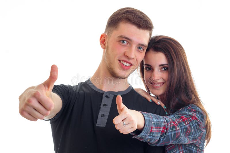 Beautiful Young Couple Stretch Hands Forward, Smile and Show the Class ...