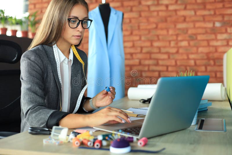 Beautiful Young Designer Thinking about New Models in Her Studio Stock ...