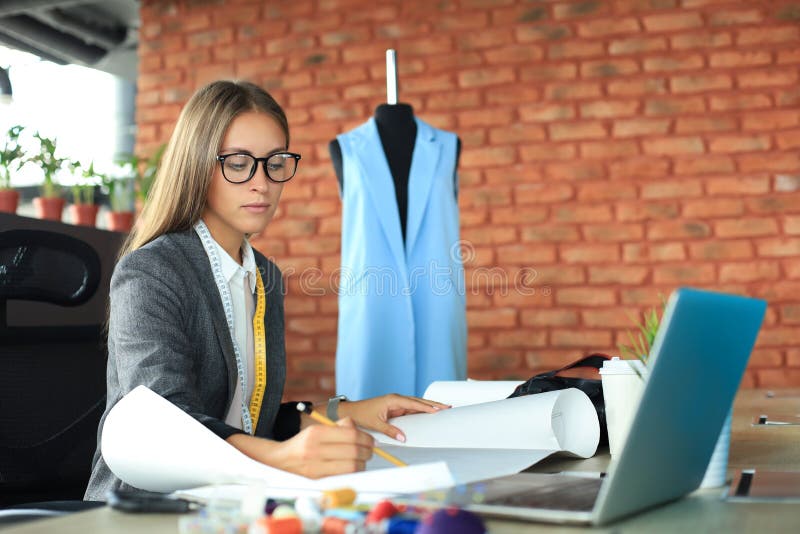 Beautiful Young Designer Working on Sketches while Sitting in Her ...