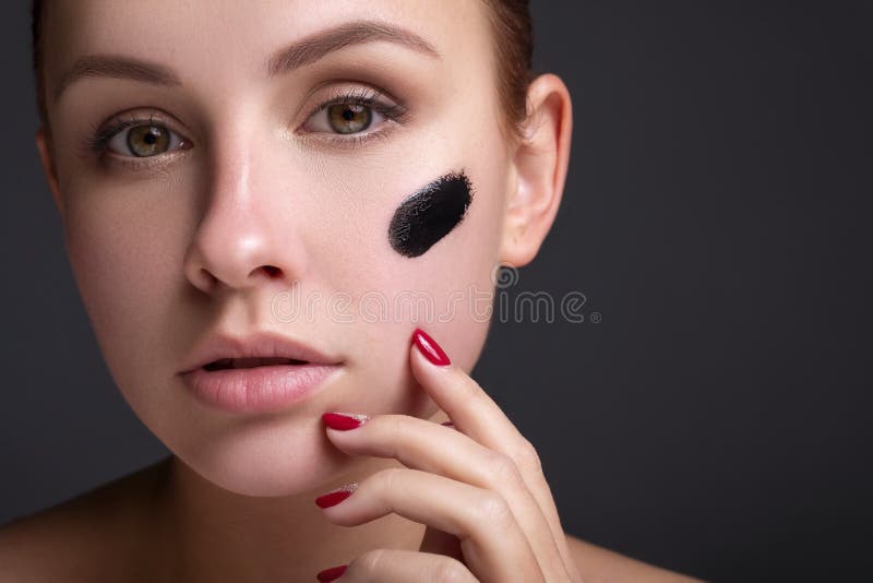 Beautiful Young European Woman Apply Clay Mask On Her Face Beauty Spa