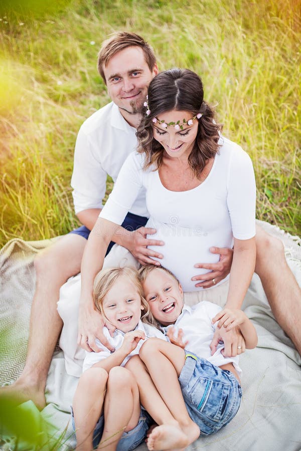 Beautiful young family stock image. Image of beauty, child - 97300145