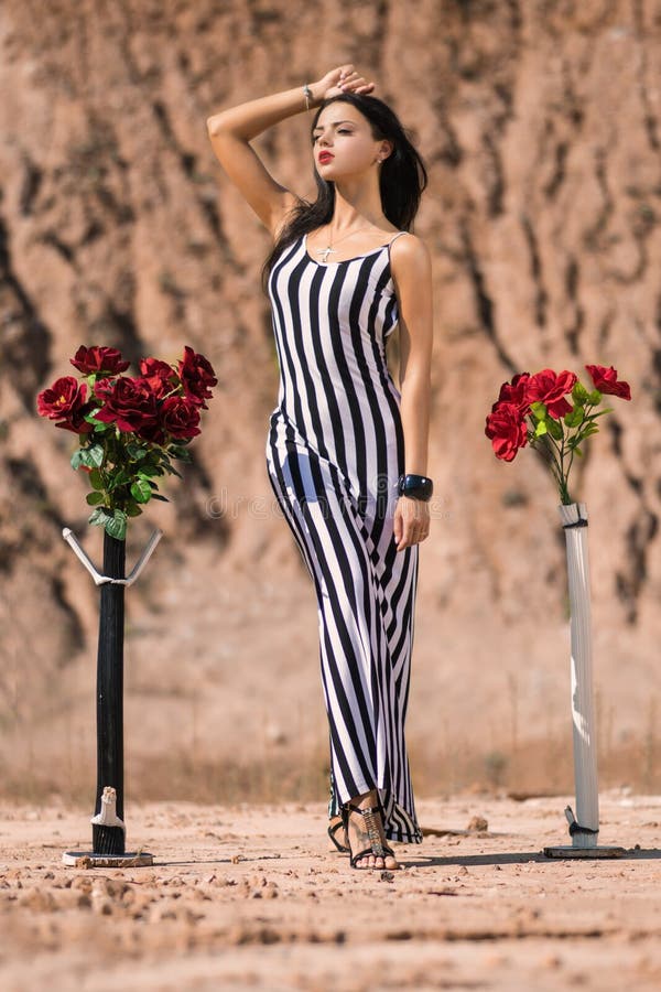Beautiful Young Fashion Model Posing on the Rocks Stock Image - Image ...