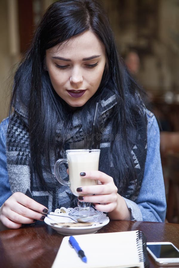 Beautiful Young Female Journalist Enjoying in a Cup of Coffee Stock ...